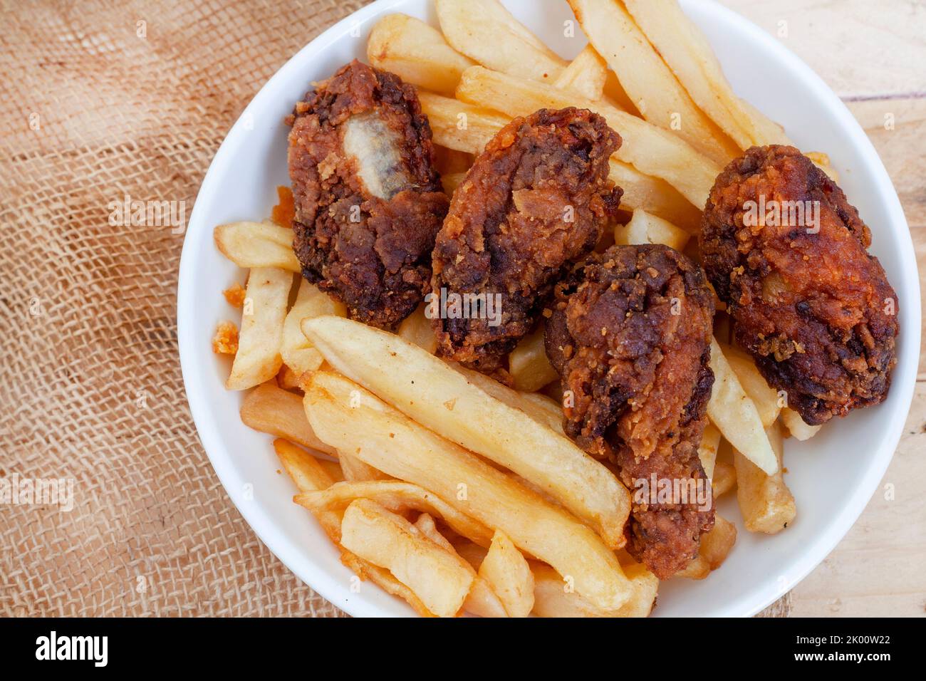 South African deep-fried chicken and chips, a popular readymade street ...