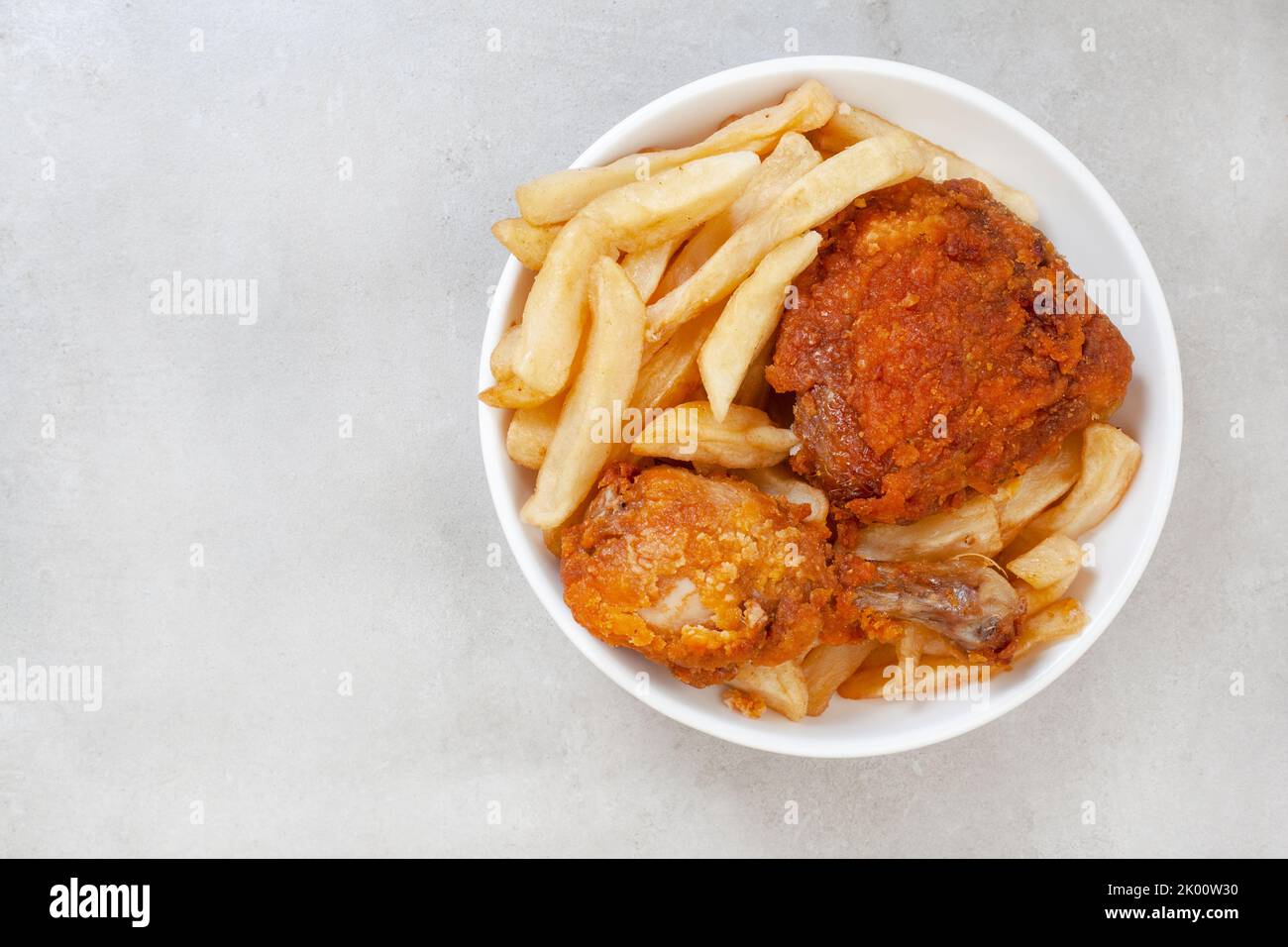 South African deep-fried chicken and chips, a popular readymade street ...
