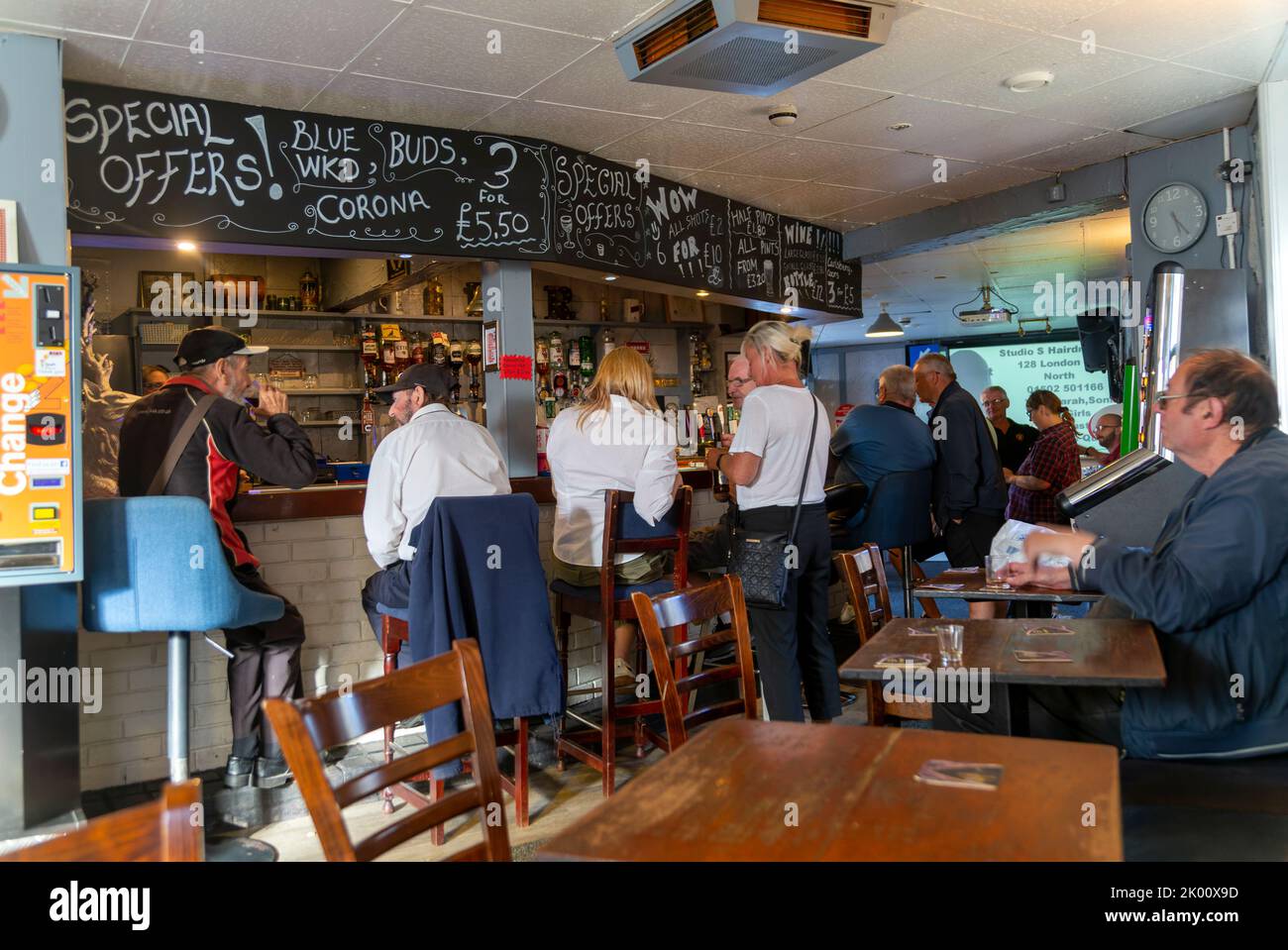 Customers inside The Welcome public house, Lowestoft, Suffolk, England ...
