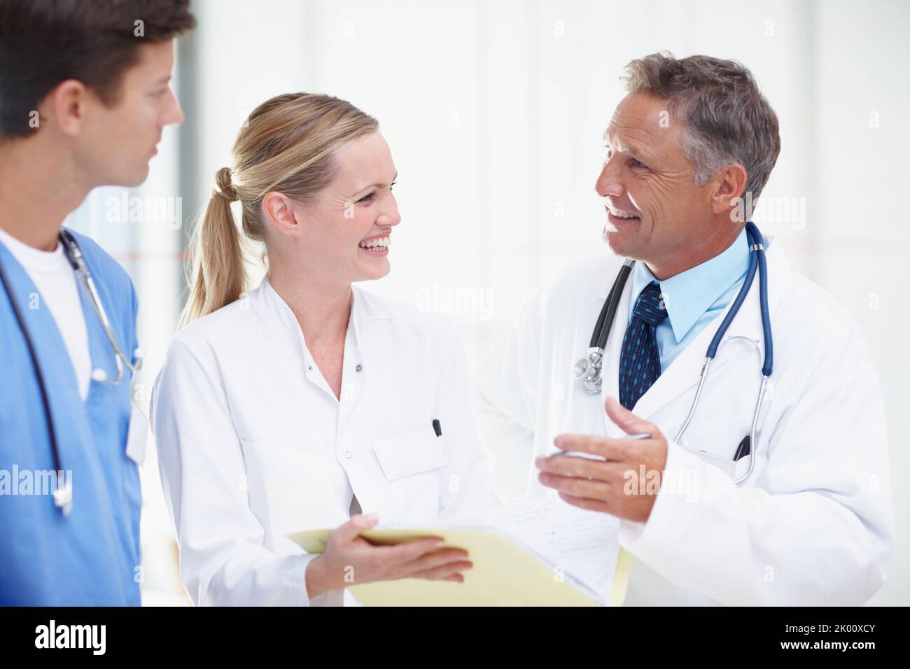 Standing three medical professionals hi-res stock photography and ...