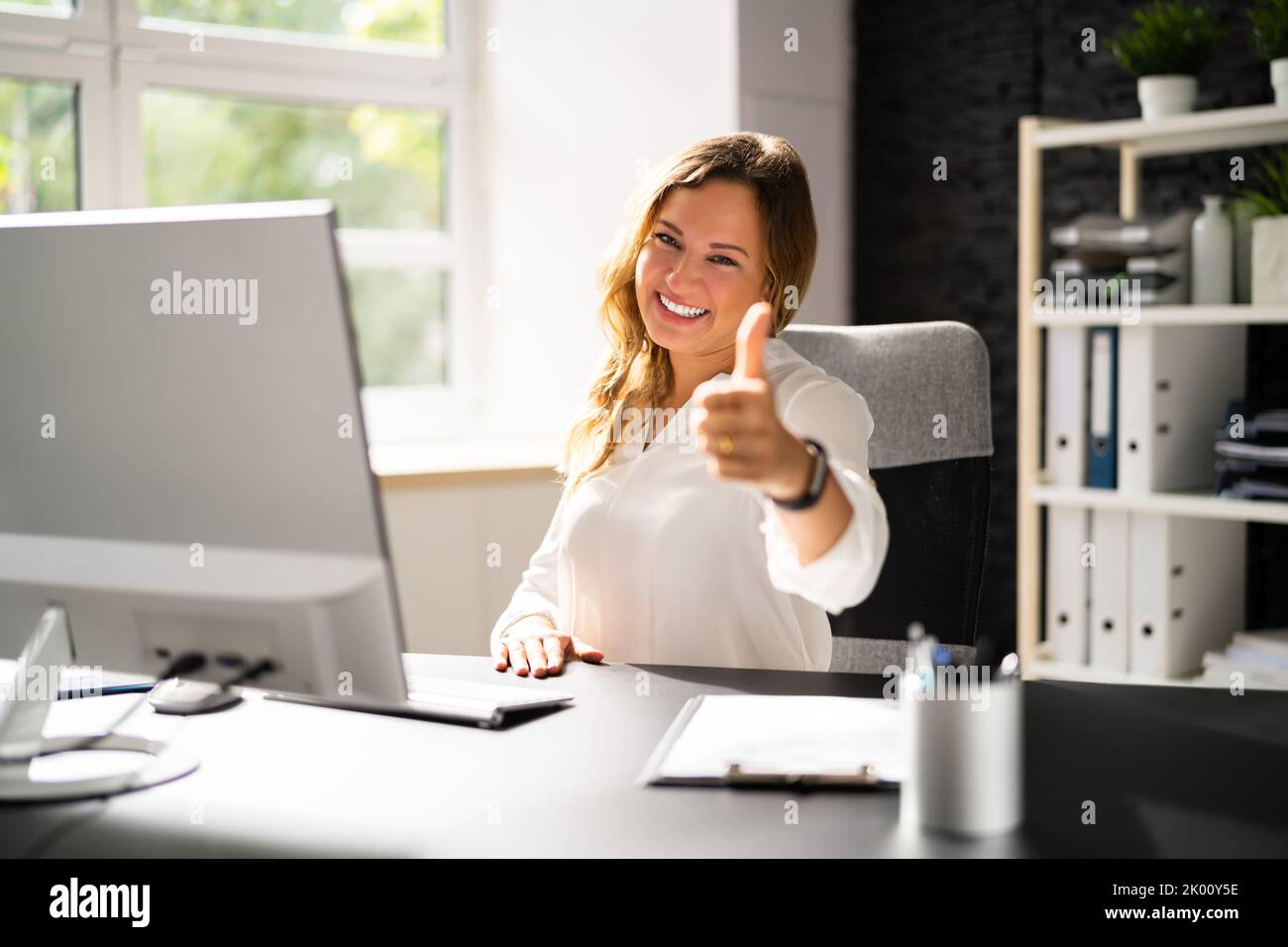 Happy Woman Person Using Computer In Office Stock Photo - Alamy