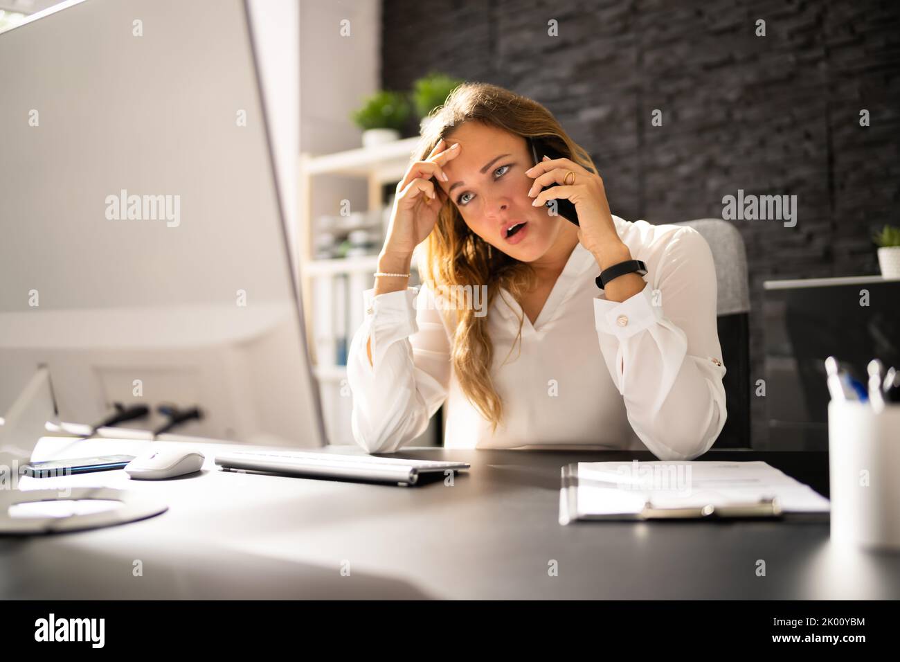 Unhappy Woman Customer Speaking With Service Company Stock Photo - Alamy