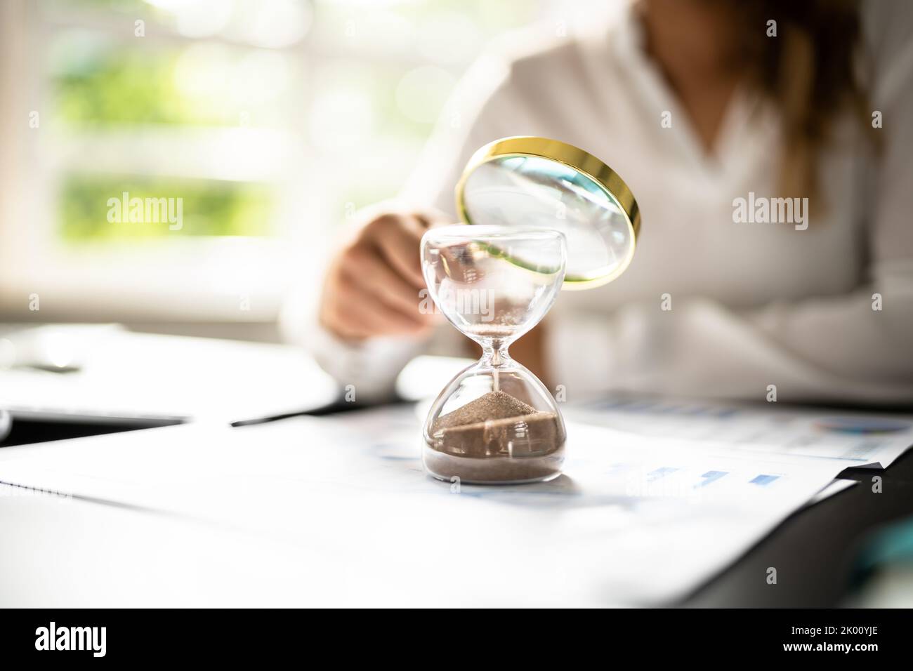 Hourglass Clock In Office Business People Work Concept Stock Photo - Alamy
