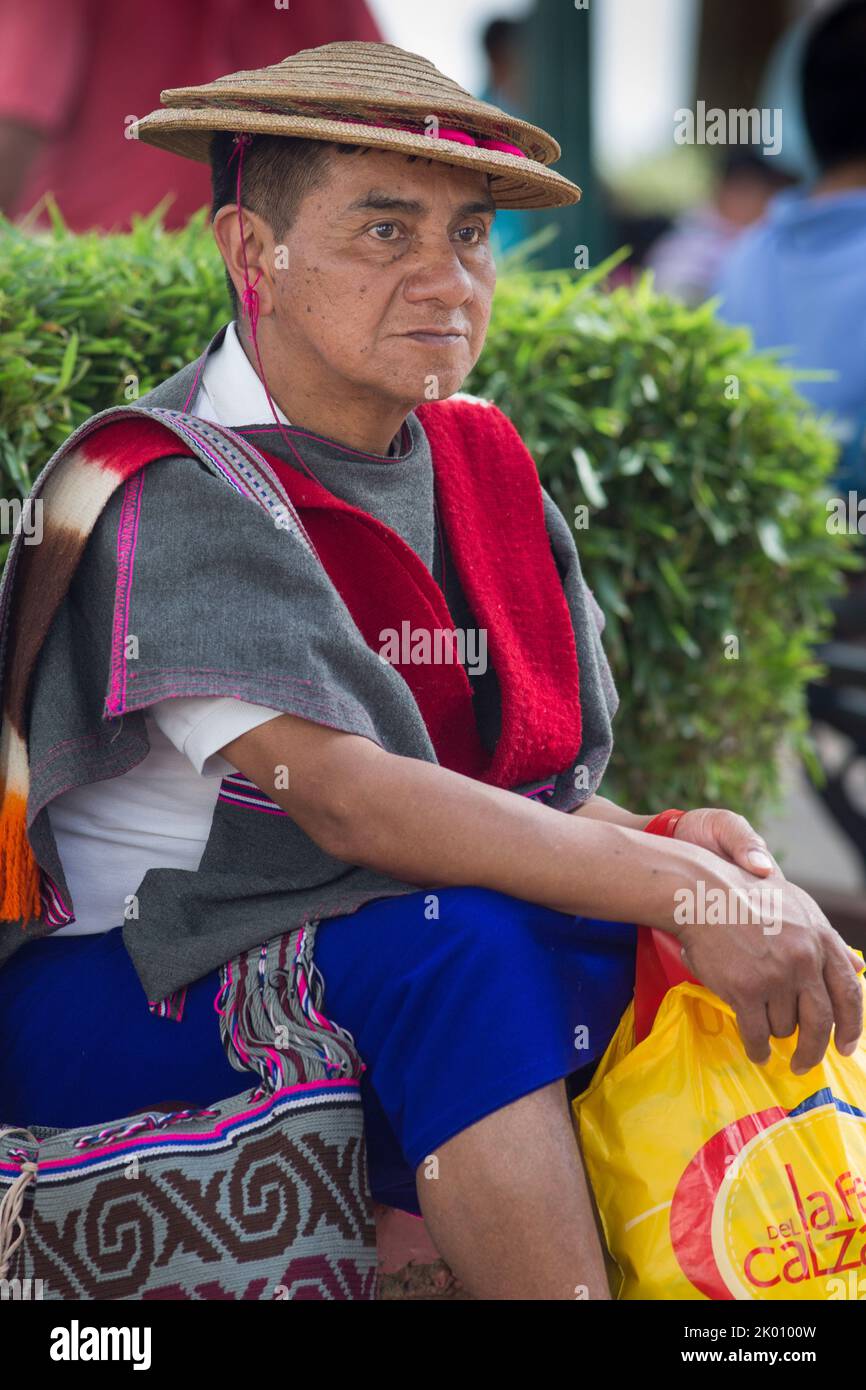Colombia, Papayan, In the Parque Caldas a Guambiano man from the ...