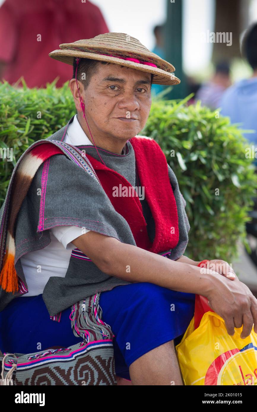 Colombia, Papayan, In the Parque Caldas a Guambiano man from the ...
