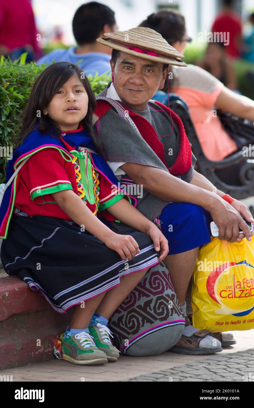 Colombia, Papayan, In the Parque Caldas a Guambiano father and daughter ...
