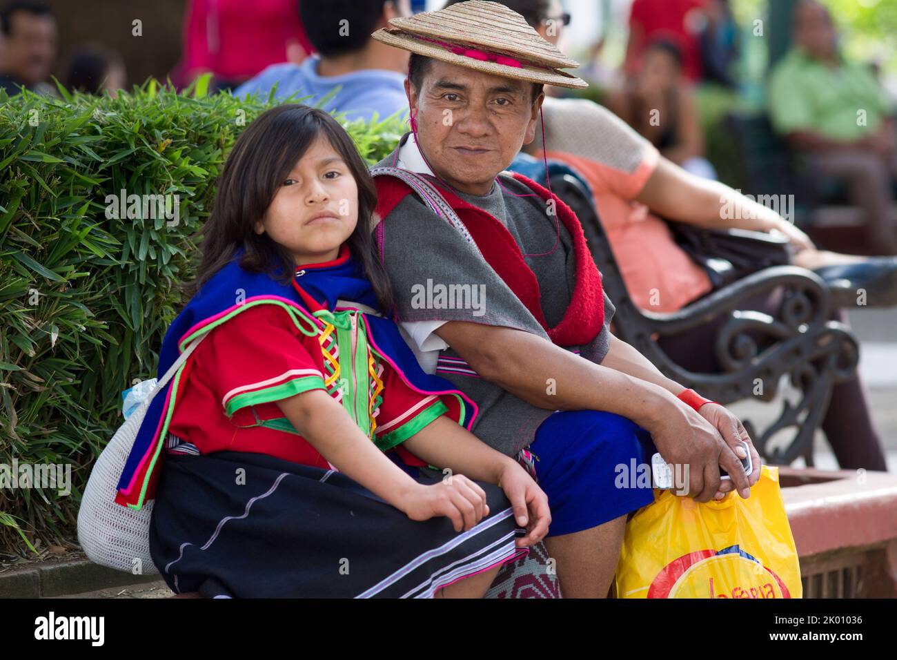 Colombia, Papayan, In the Parque Caldas a Guambiano father and daughter ...