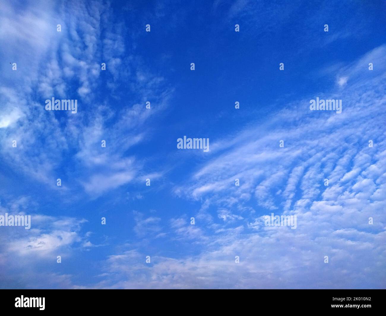 white cloud flying in blue sky Stock Photo - Alamy