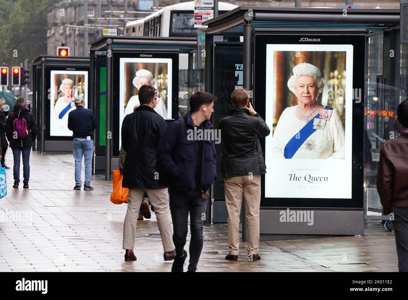Tributes to Queen Elizabeth II on bus stops on Princes Street in ...