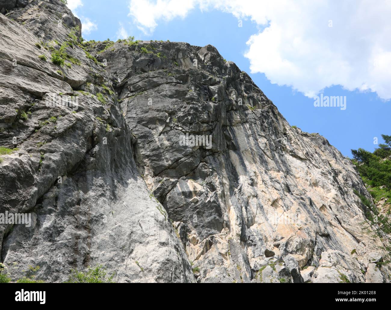 wide rock face of the Italian alps without people Stock Photo - Alamy