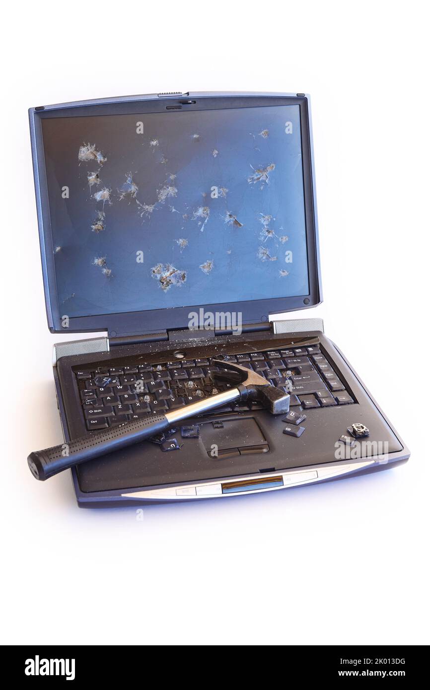 Broken screen laptop and hammer isolated on white. Damaged device Stock ...