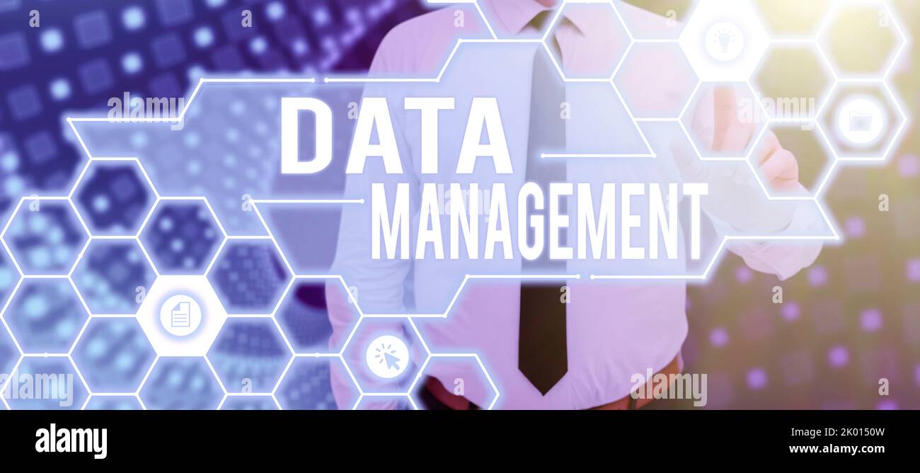 Hand writing sign Data ManagementThe practice of organizing and maintaining data processes ...