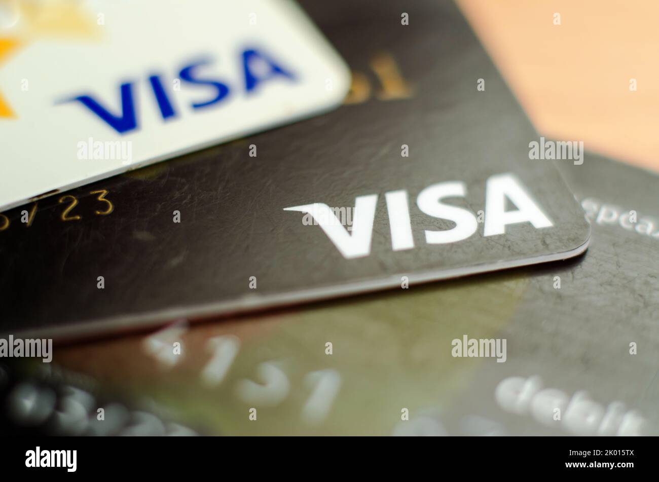 The inscription on the plastic card Visa close-up, selective focus ...