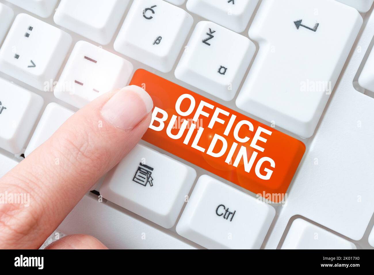 Hand writing sign Office BuildingCommercial buildings are used for ...