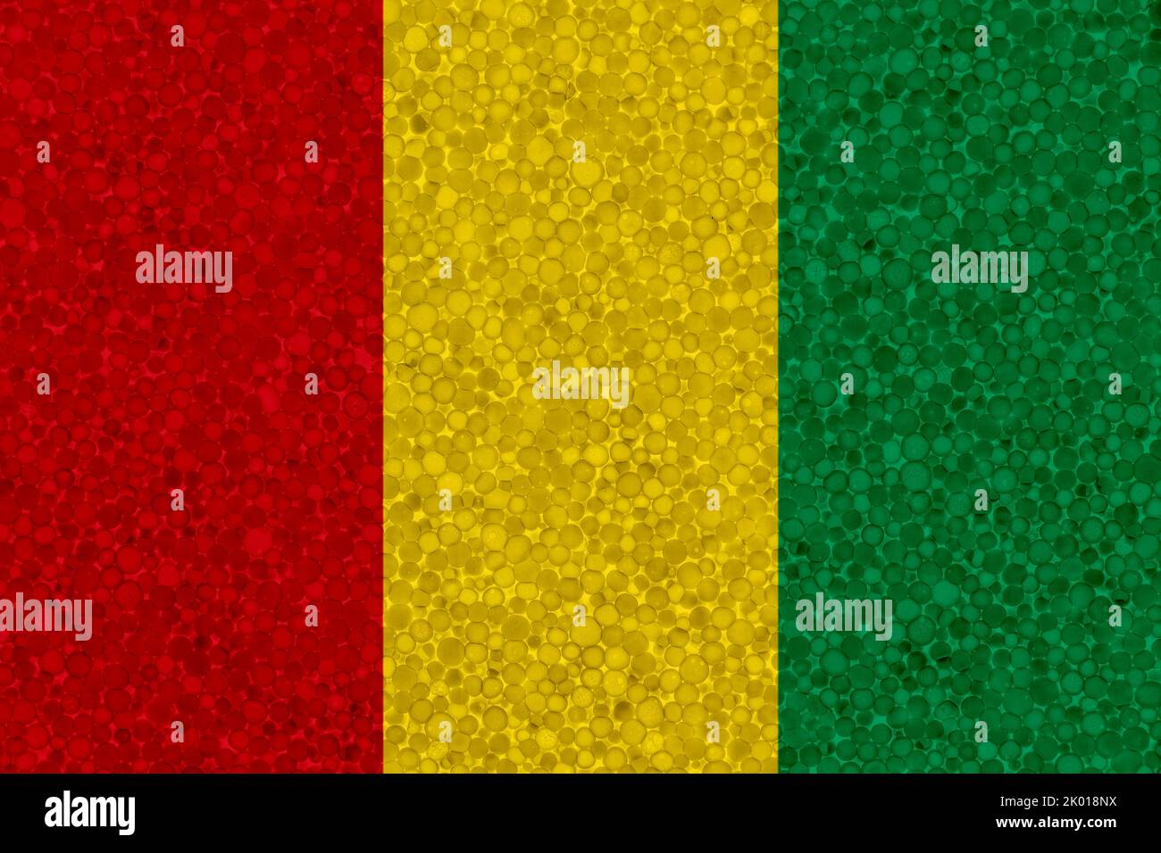 Flag of Guinea on styrofoam texture. national flag painted on the ...