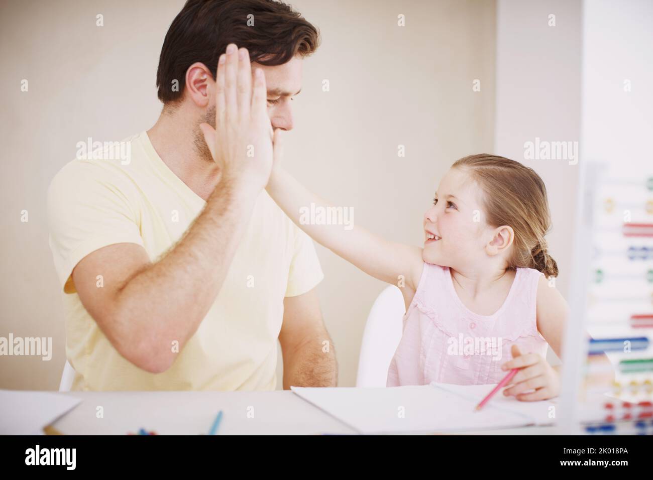 She always does her homework. a little girl doing her homework Stock ...