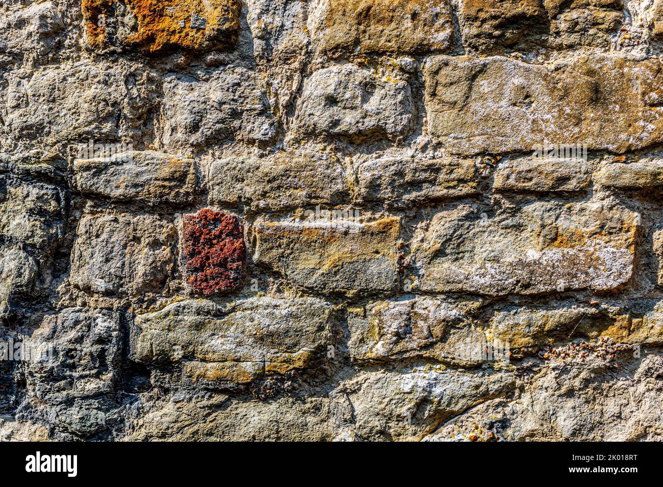 An old worn stone wall Stock Photo - Alamy