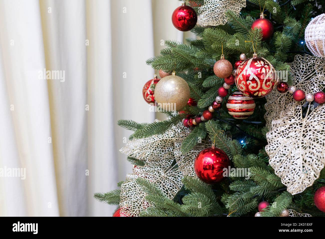 Close up of balls on christmas tree. background New Year concept Stock ...