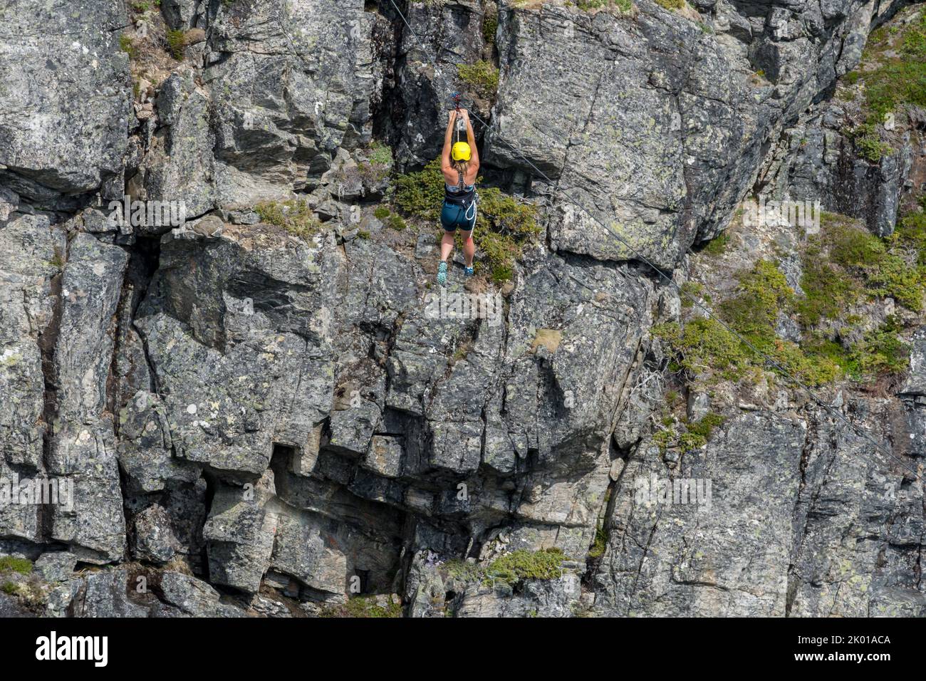 In flight hanging from a cable extreme sports in Norway Stock Photo - Alamy