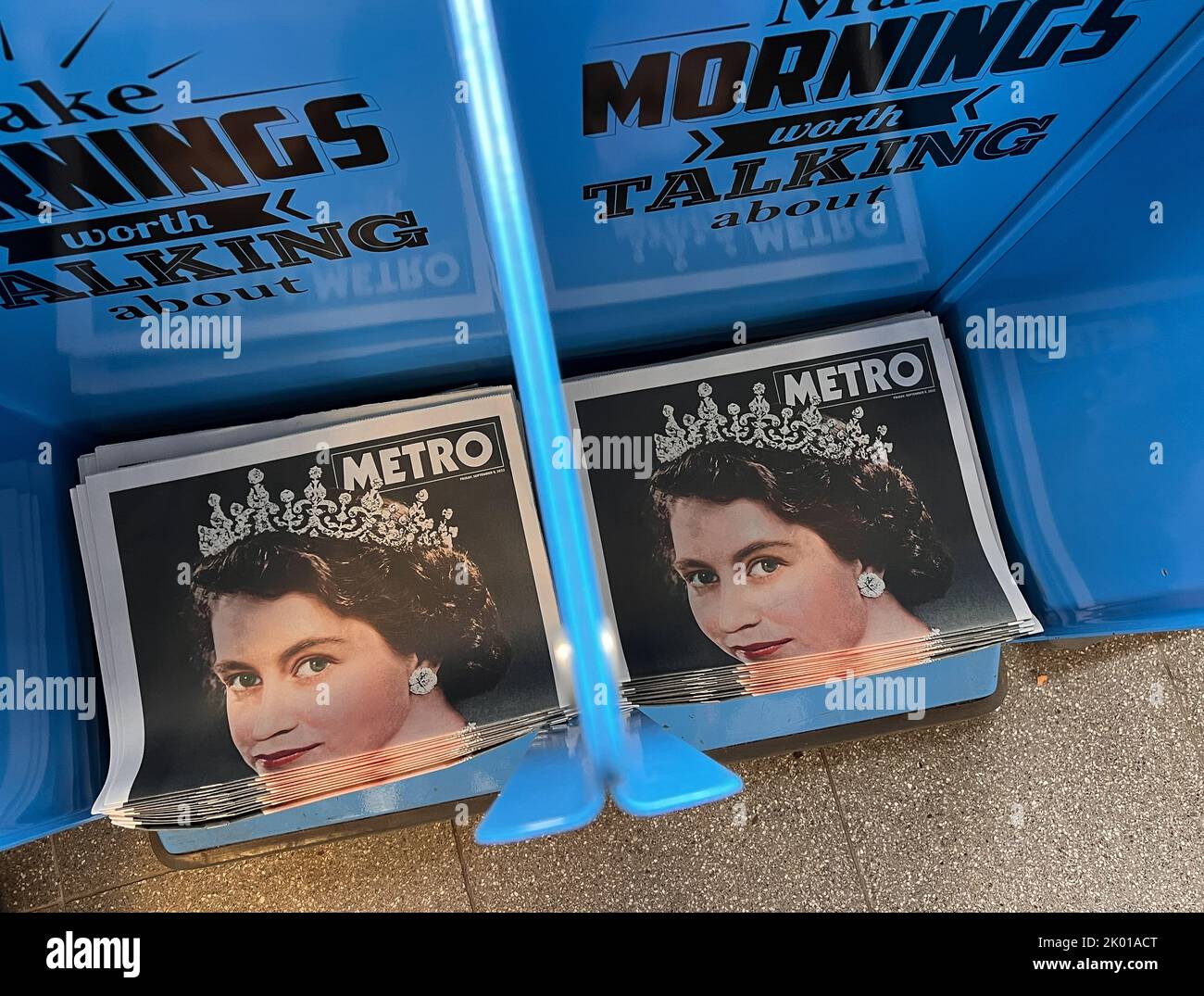 Copies of the Metro newspaper reporting the death of Queen Elizabeth II ...