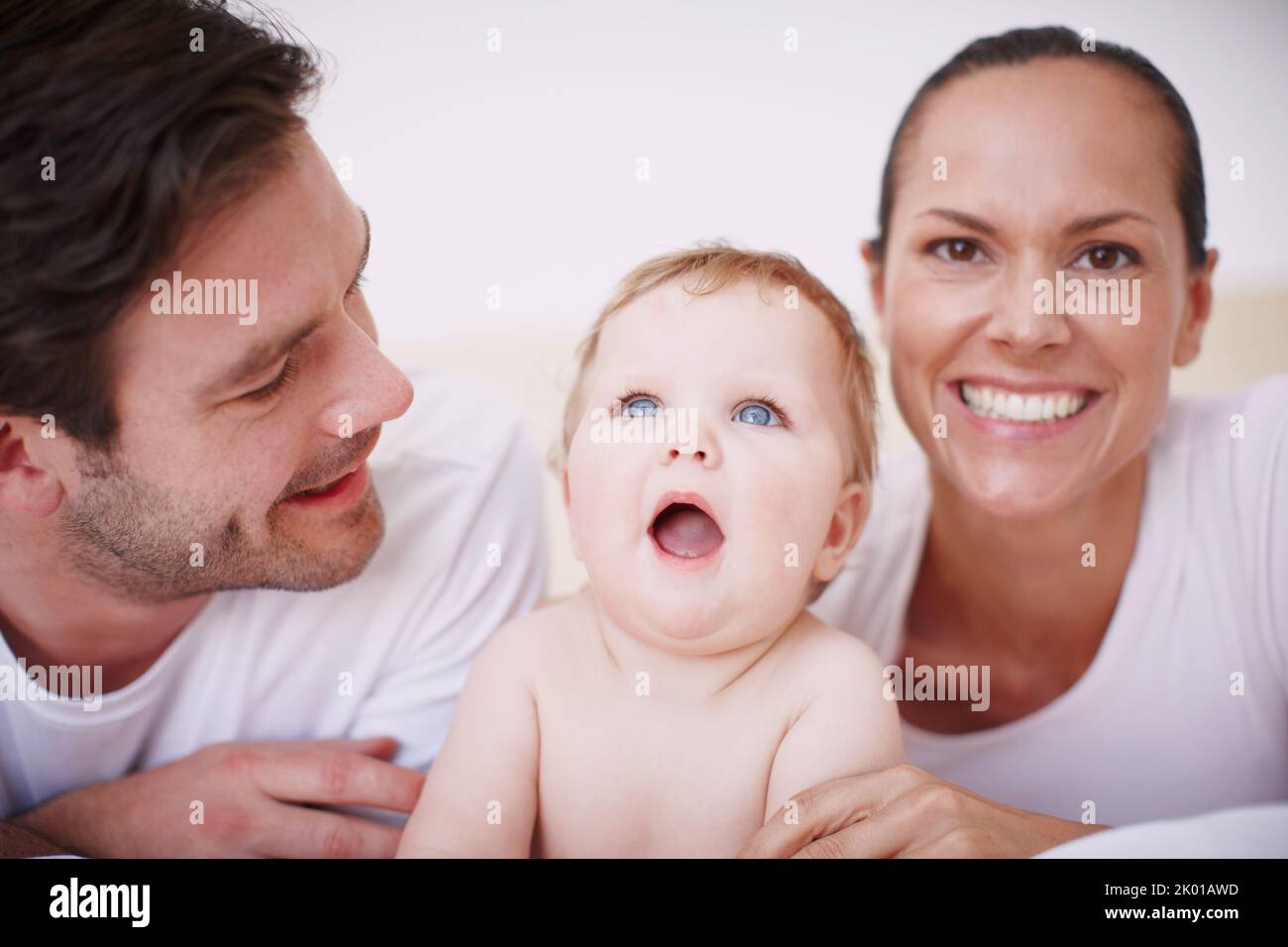 She has the cutest. Two loving young parents and their adorable baby ...