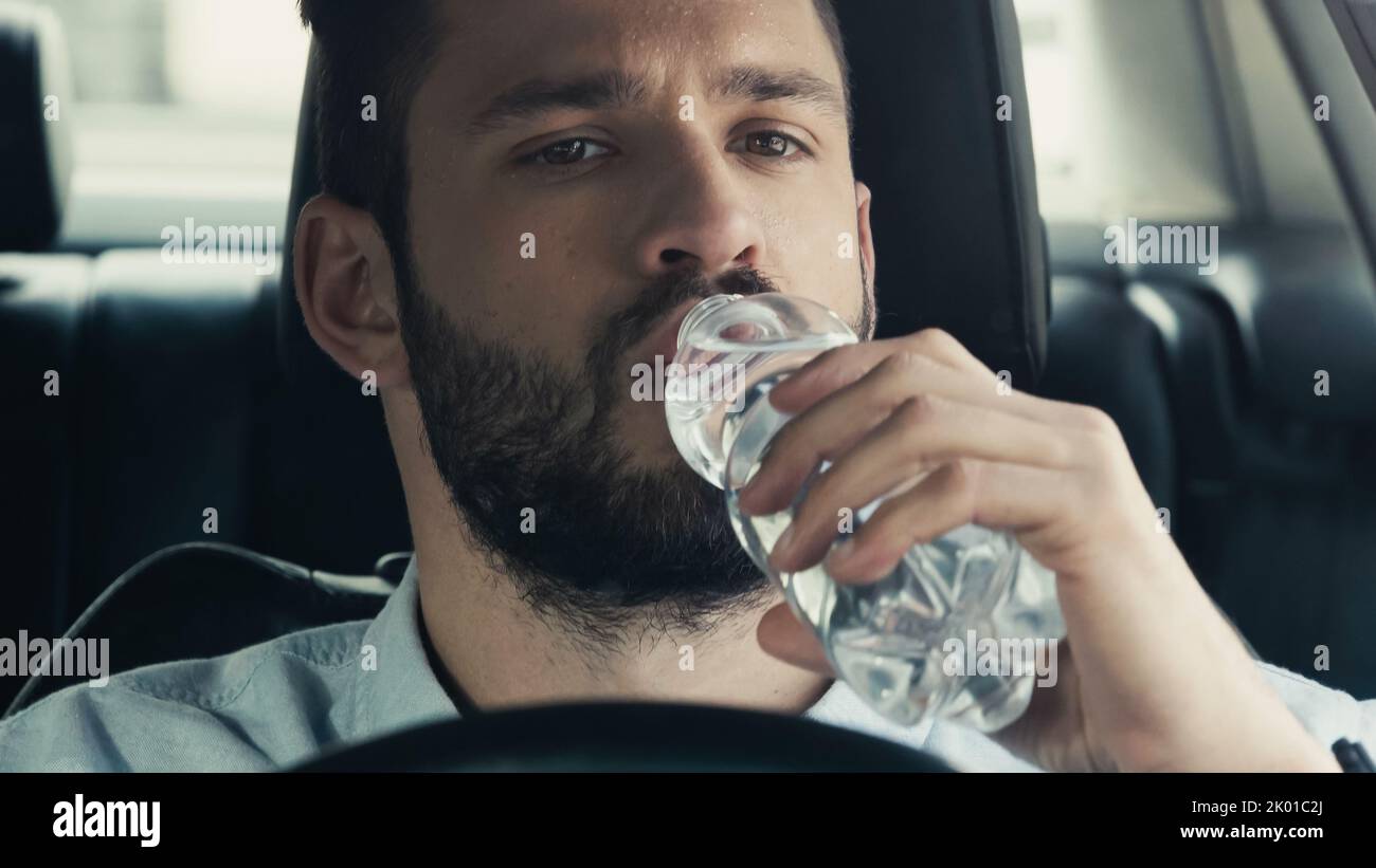Bearded man drinking from plastic hi-res stock photography and images ...