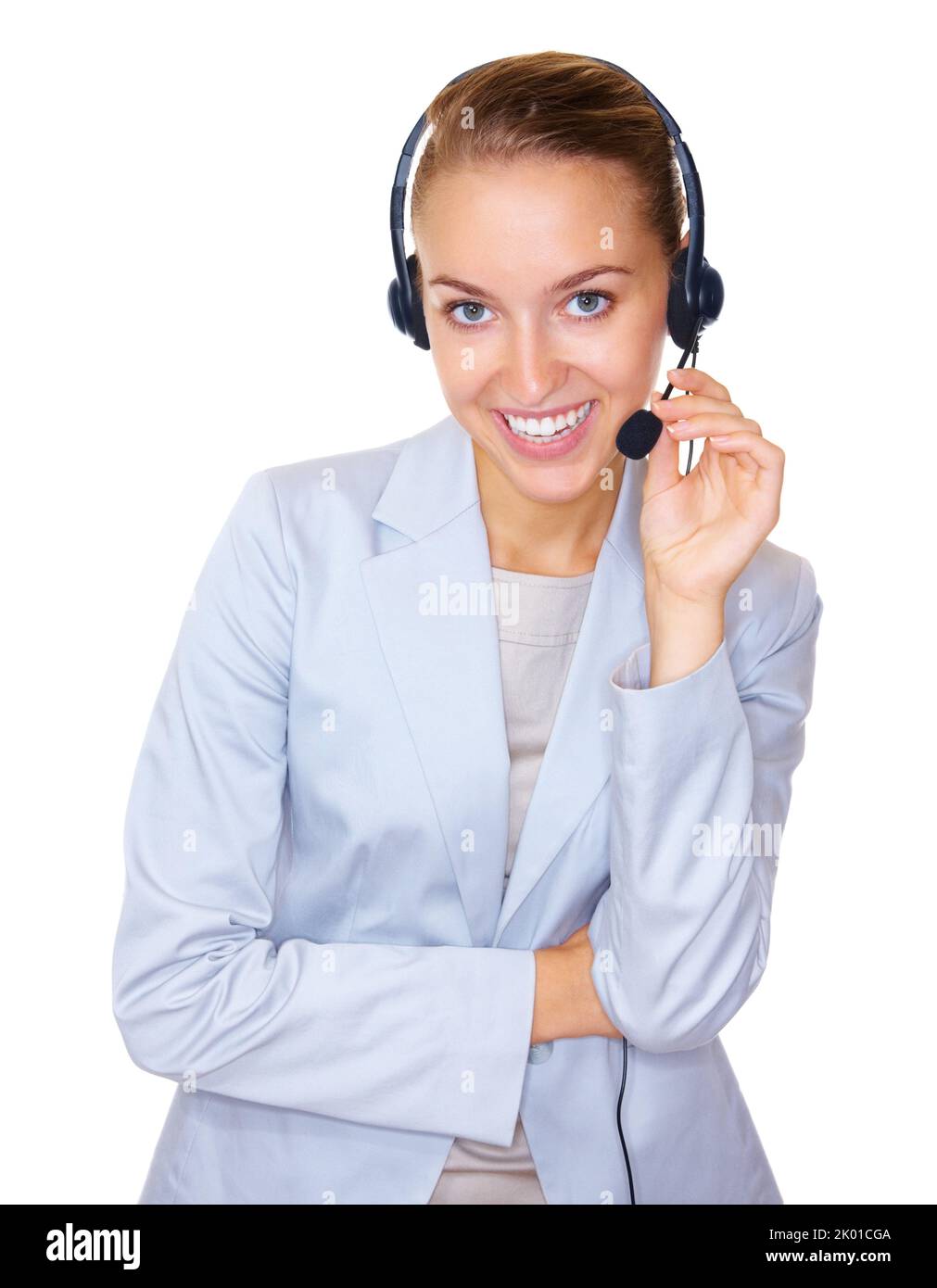 Pretty female secretary speaking on the headset against white. Portrait ...