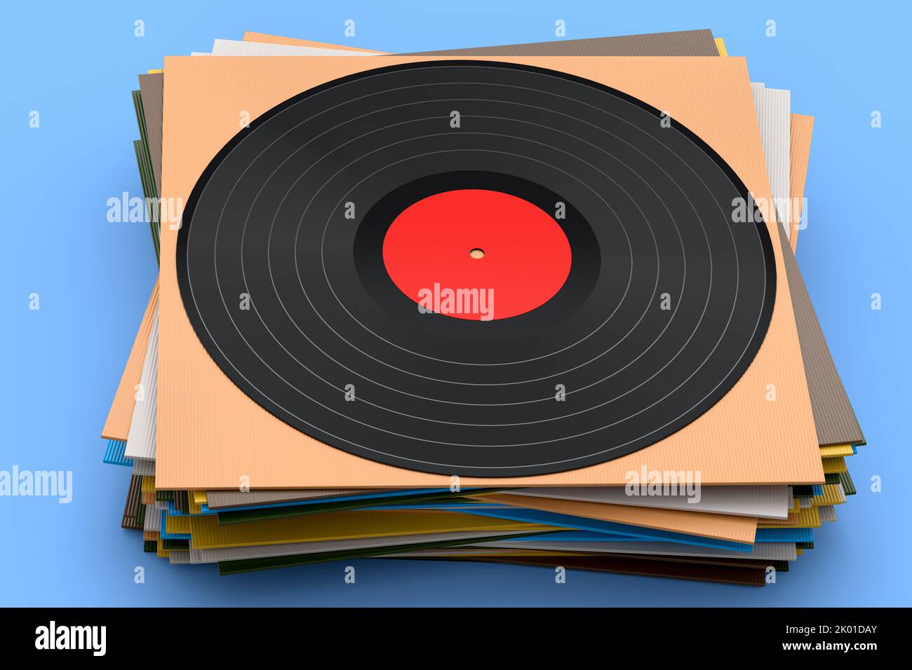 Black vinyl LP record with heap of covers isolated on blue background ...