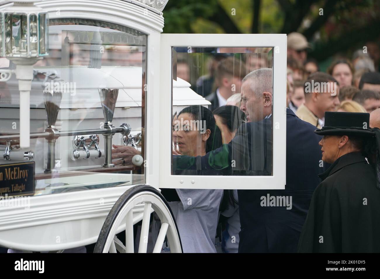 The coffins of Lisa Cash, 18, and her eight-year-old twin siblings ...