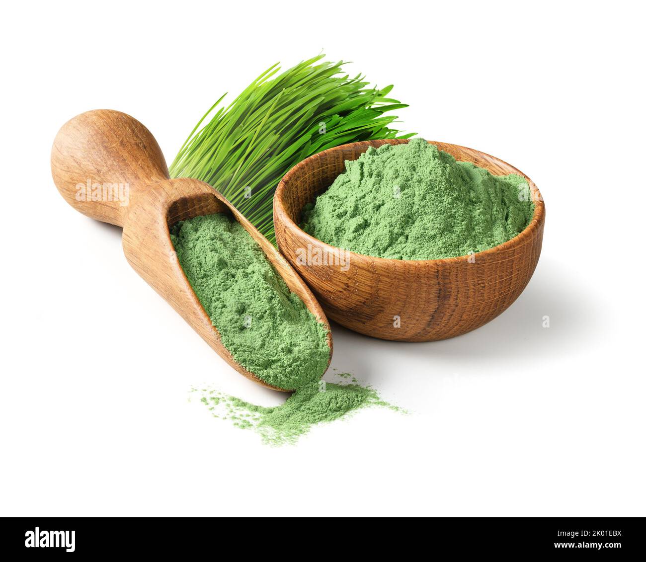 Barley grass green powder in wooden bowl with wodden spoon, and green ...