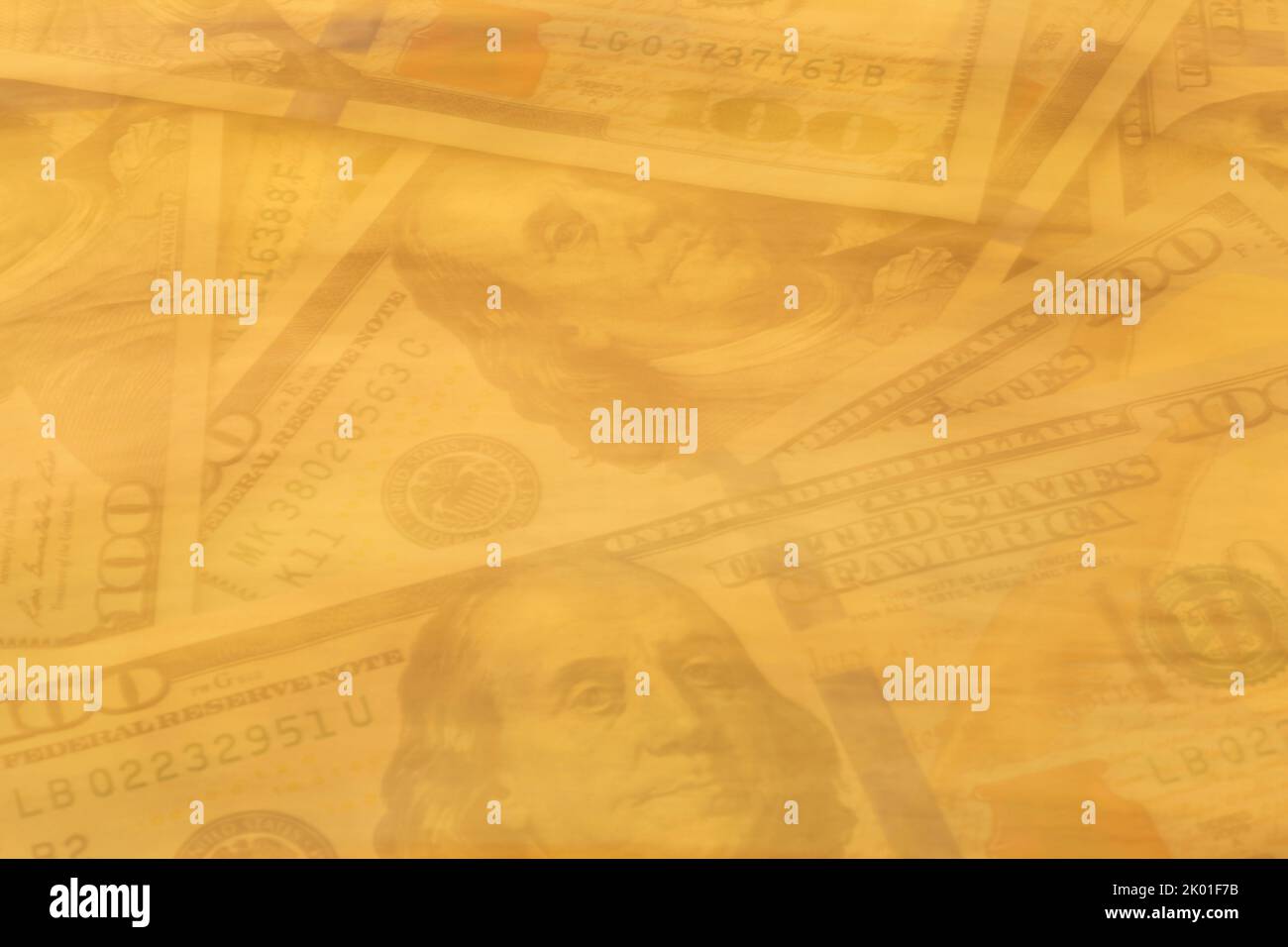 abstract golden color financial background: blurred heap of United ...