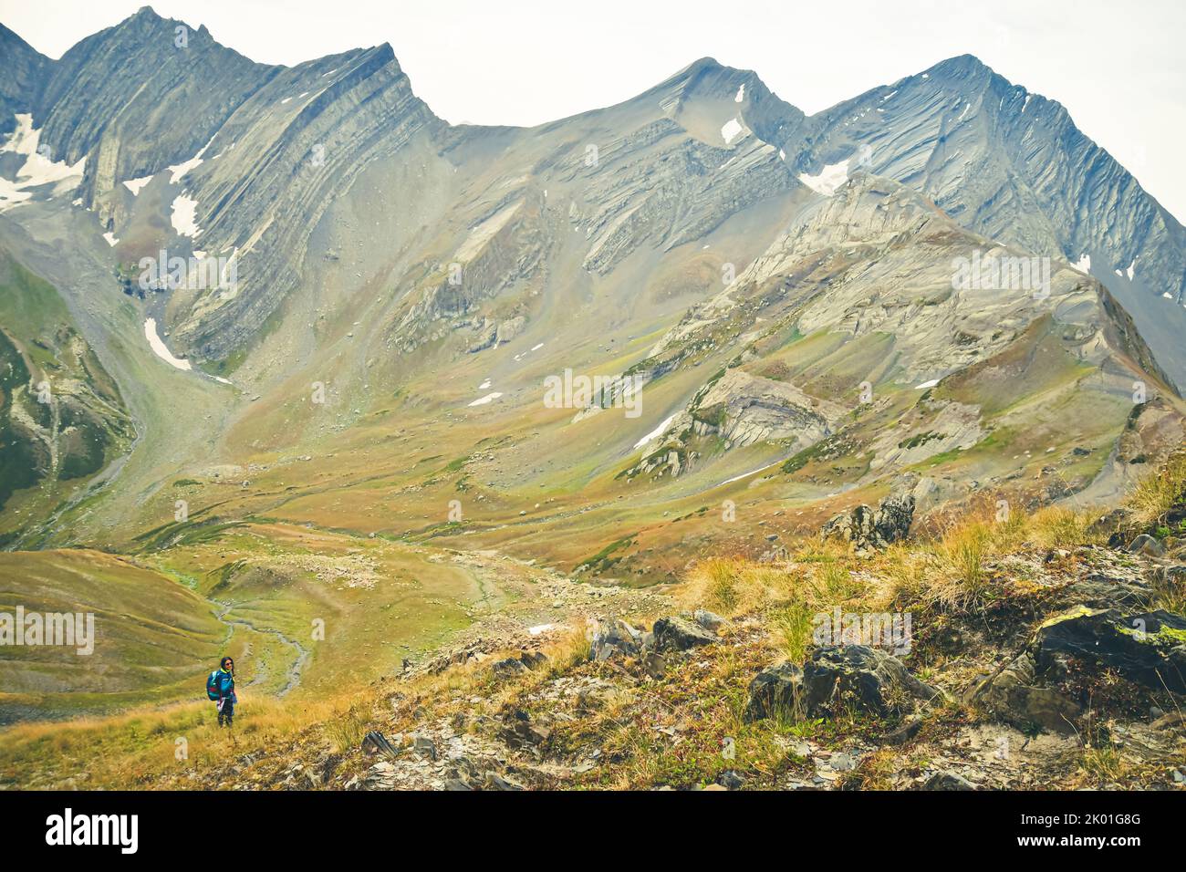 Side view happy tourist female hiker smile look to camera on viewpoint ...