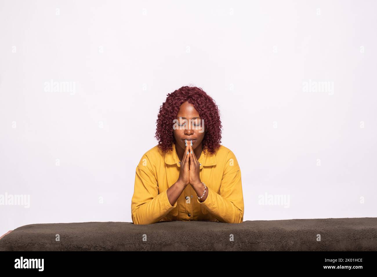 Black prayers hi-res stock photography and images - Alamy