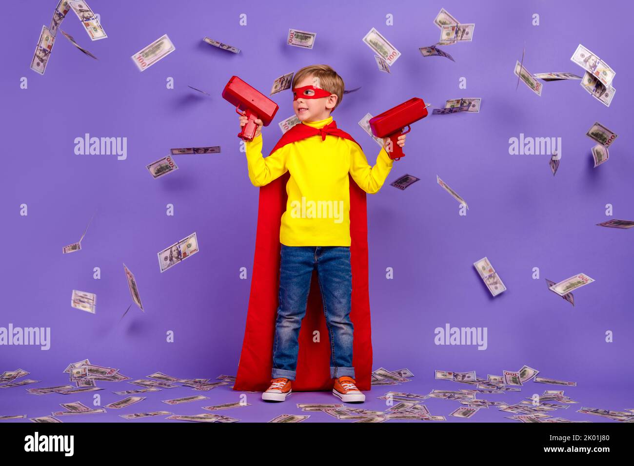 Full length photo of positive excited small son wear red superhero ...