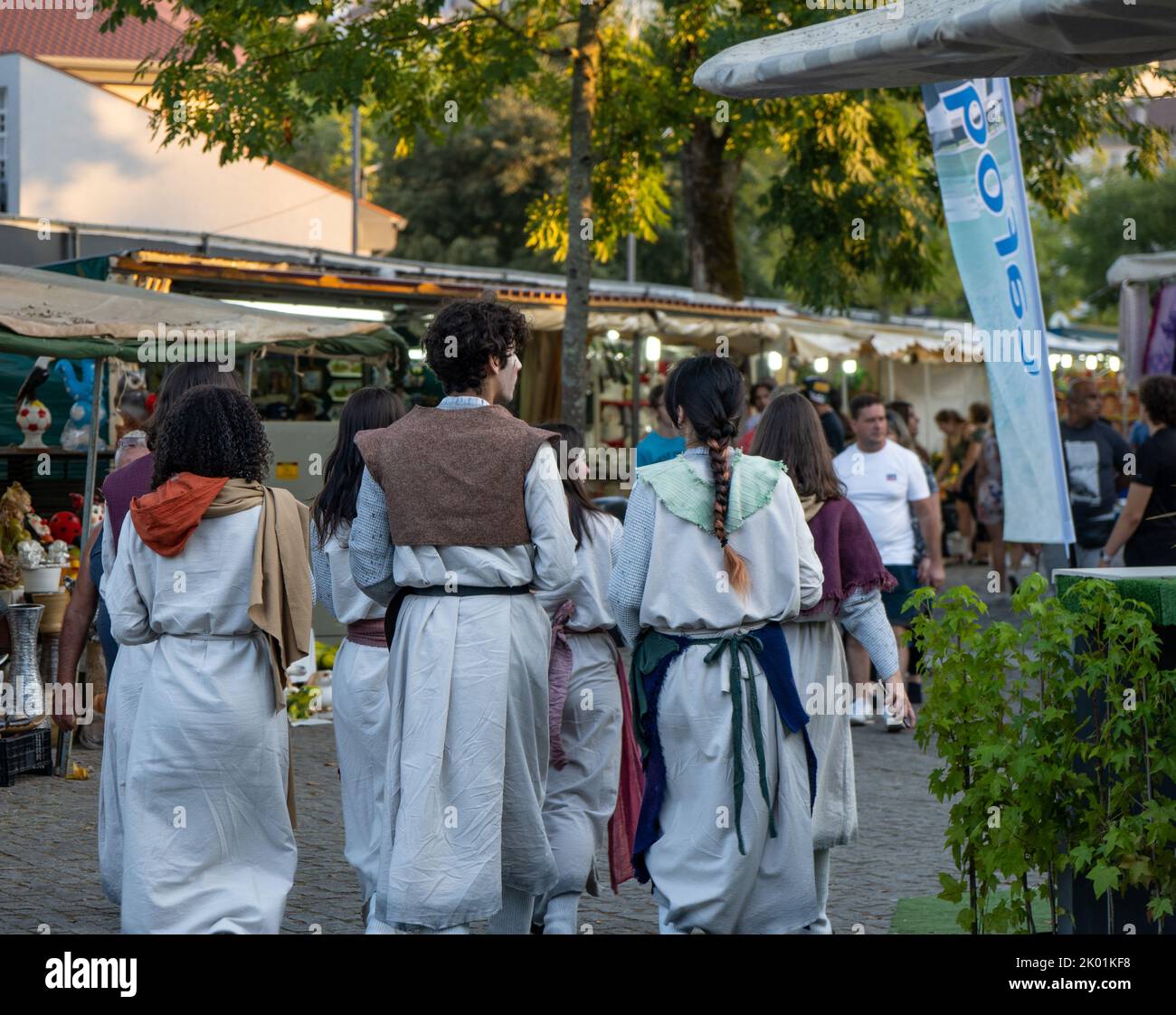 Group of young people dressed in religious clothes of pilgrims or ...