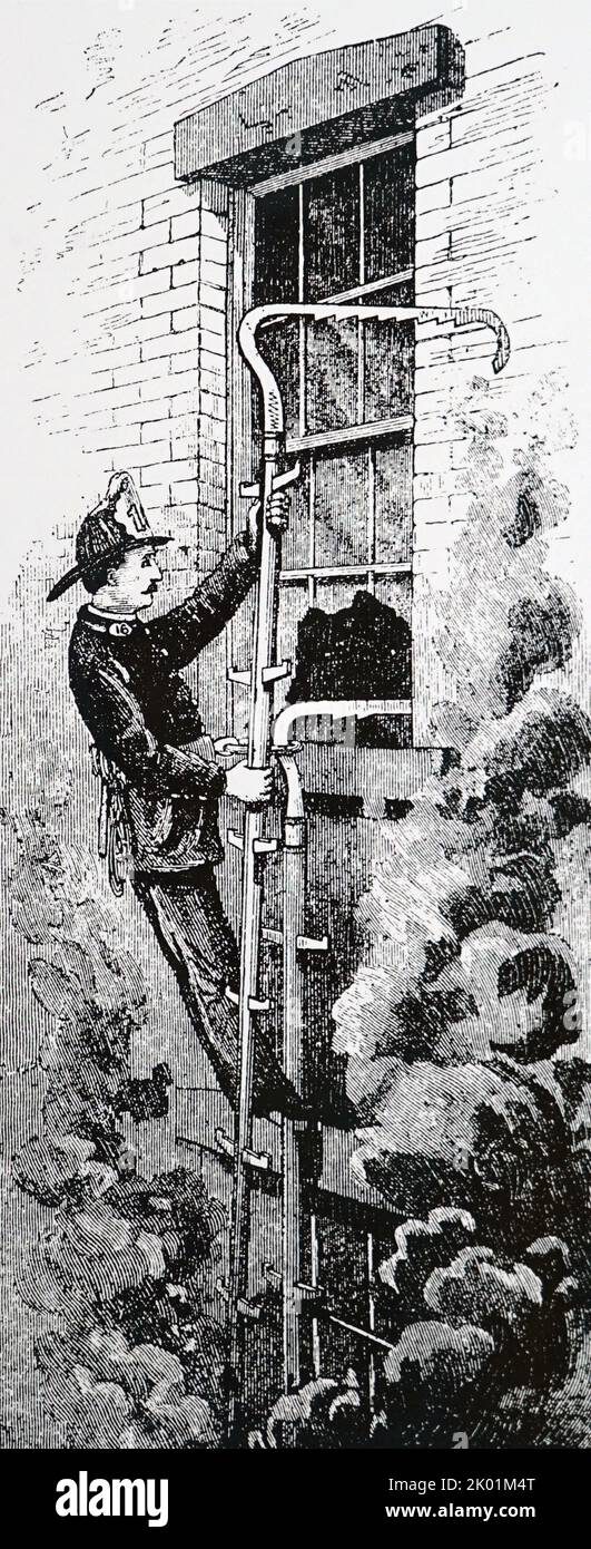 A New York fireman using an escape ladder to reach the upper storeys of ...