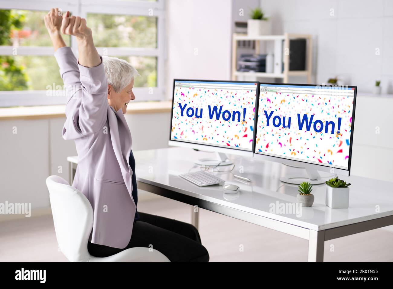 Winner woman office hi-res stock photography and images - Alamy
