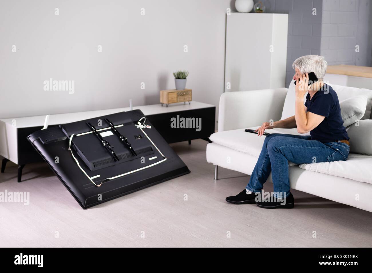 Broken Fallen TV On Television Damage Accident Stock Photo - Alamy