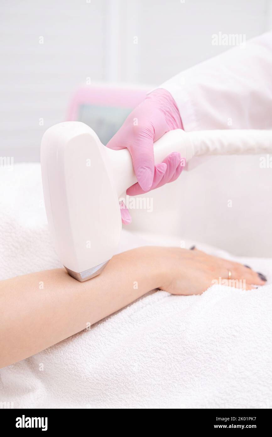 Laser hair removal on the arm hi-res stock photography and images - Alamy