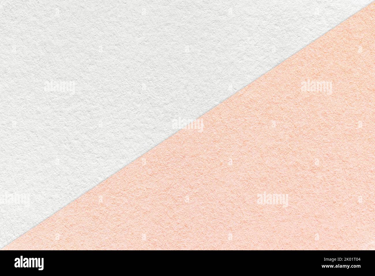 Texture of craft white and light pink paper background, half two colors ...