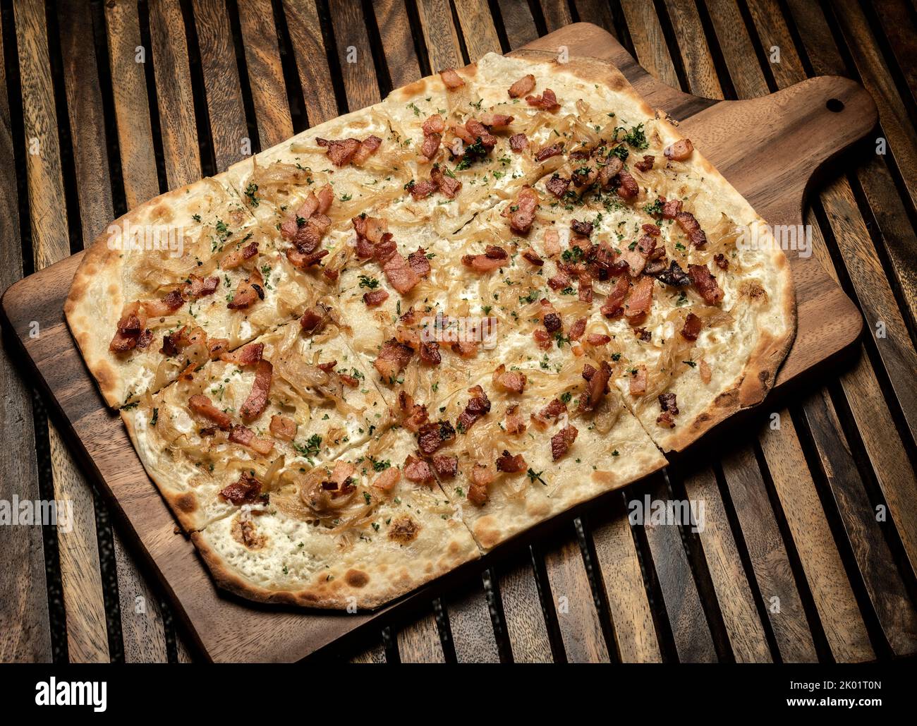 Flammkuchen tarte flambee rectangular pizza with bacon and chicken on ...