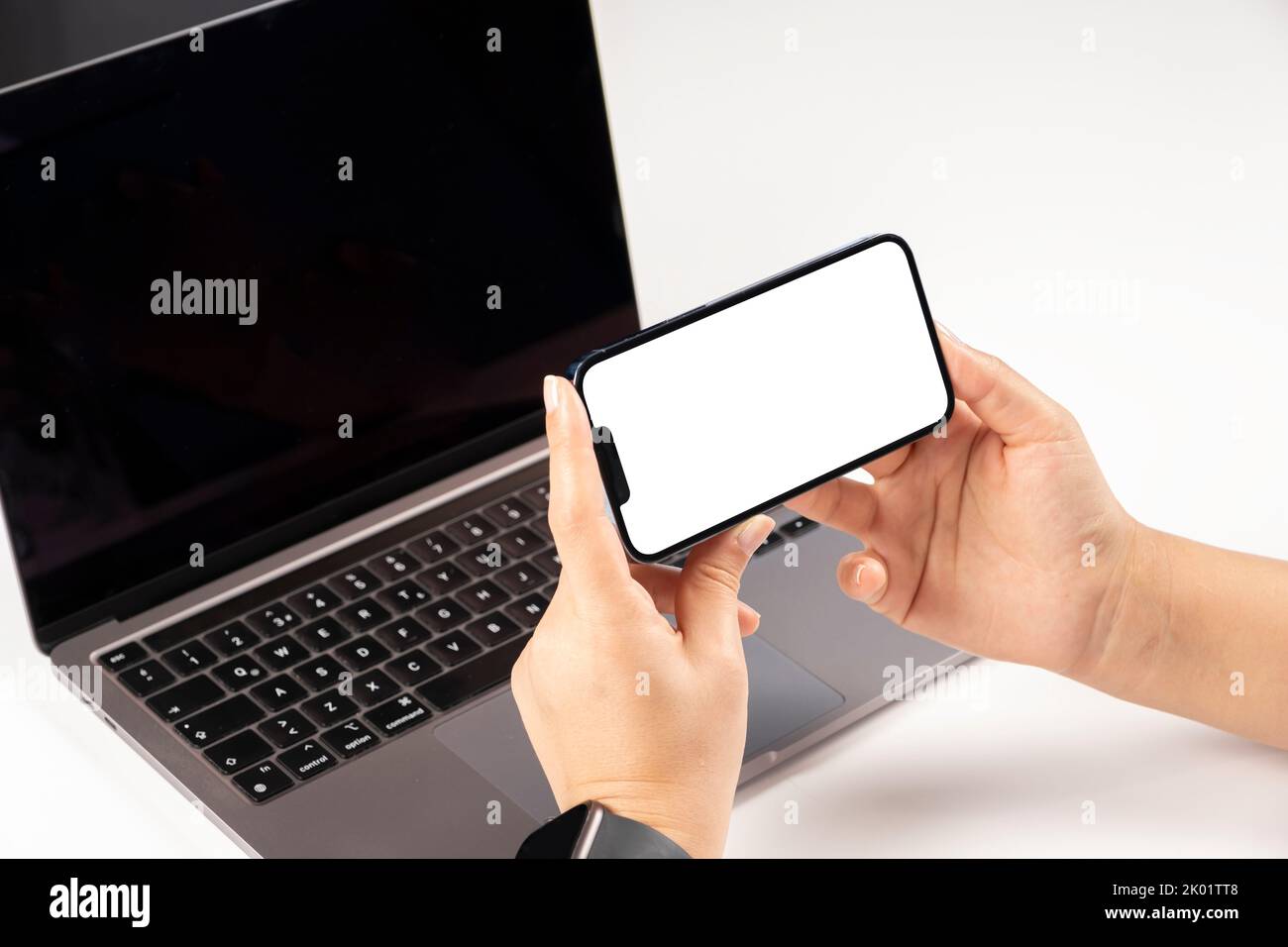 Modern phone mock up, office worker holding modern phone mock up. Close ...