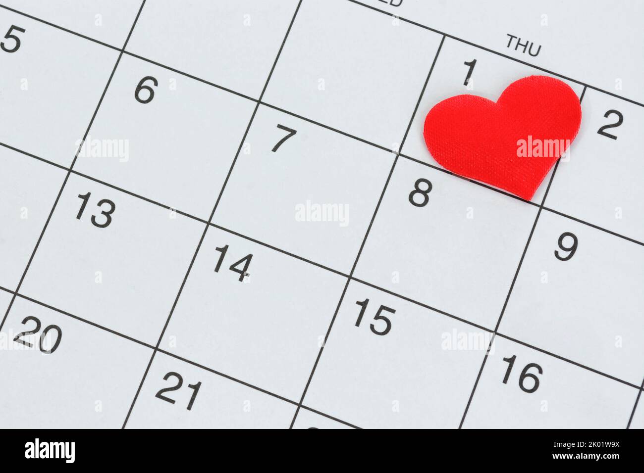 Red heart shape on the date of the 1st day in the calendar Stock Photo ...