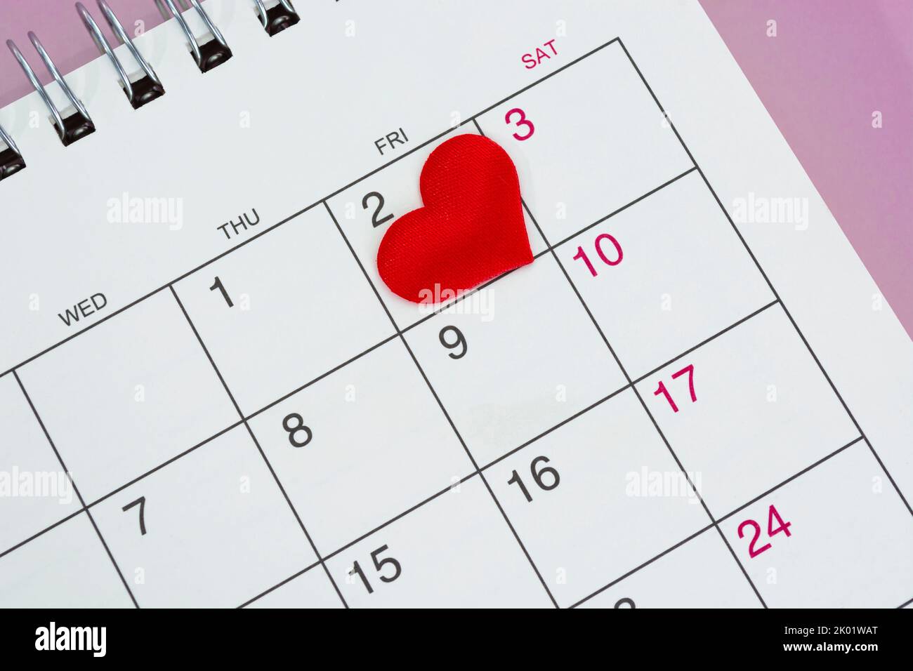 Red heart shape on the date of the 2nd day in the calendar Stock Photo ...