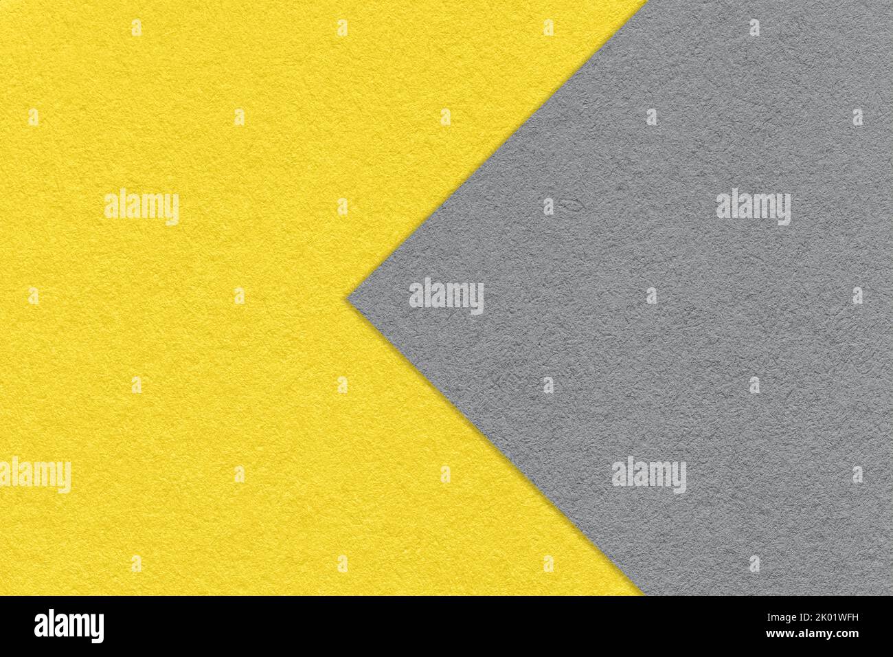 Texture of yellow paper background, half two colors with gray arrow ...