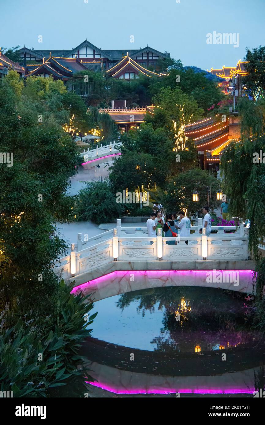 A vertical shot of a beautiful garden with traditional Chinese ...