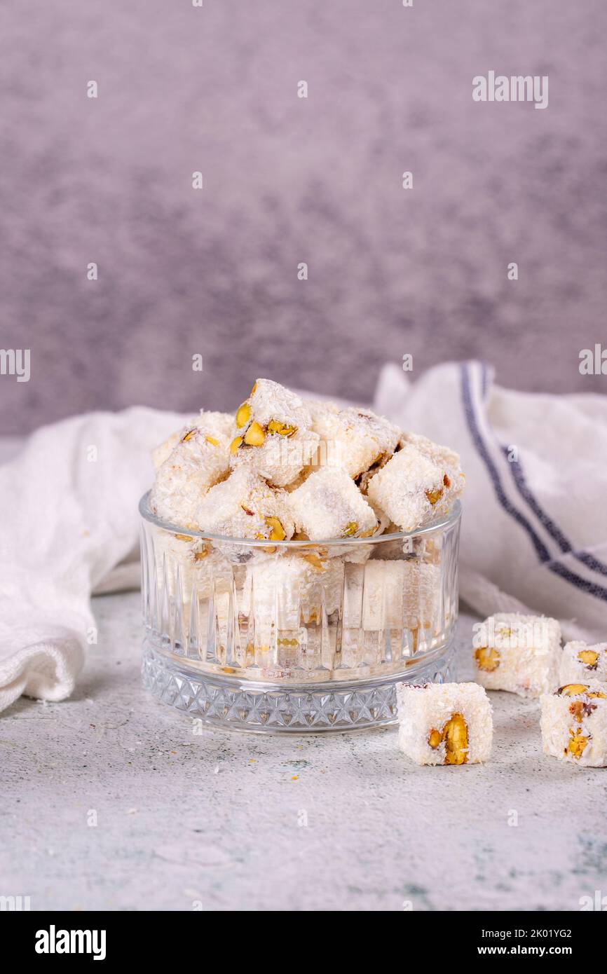 Turkish Delight with Coconut and Pistachio. Sweet Turkish delight on ...