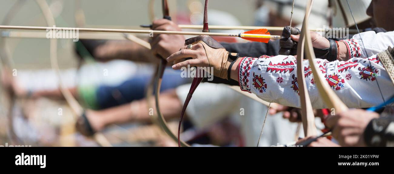 Archers getting ready with their bows and arrows when participating at ...