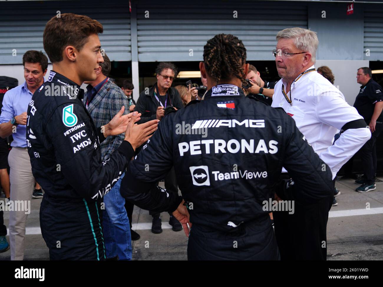 Formula One managing director Ross Brawn (right) with Mercedes' drivers ...