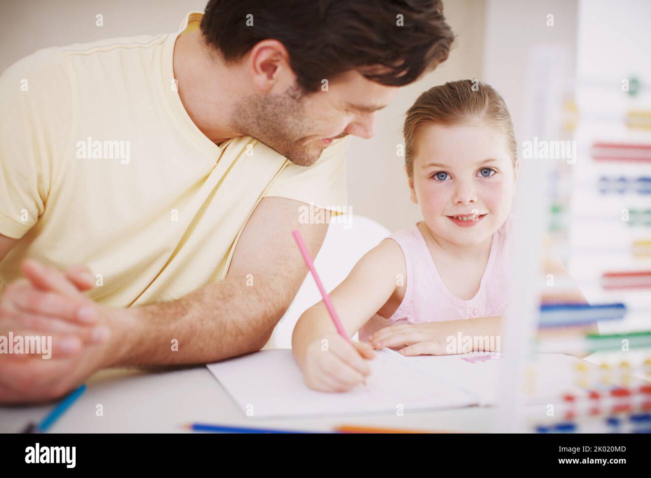 She always does her homework. a little girl doing her homework Stock ...